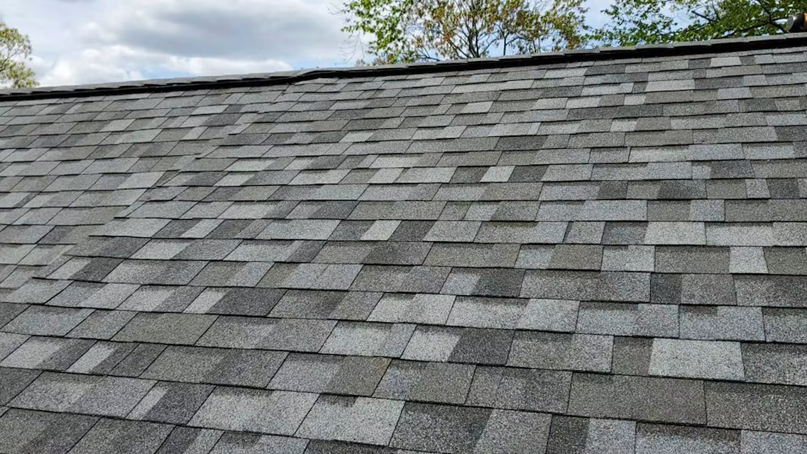 How Much Does Bundle of Roofing Shingles Weigh? - Davis Roofing Co.